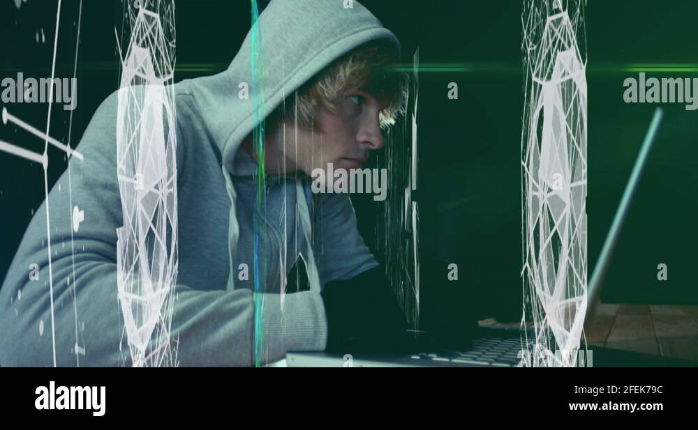 Shapes floating and spinning over Caucasian male hacker wearing a ...