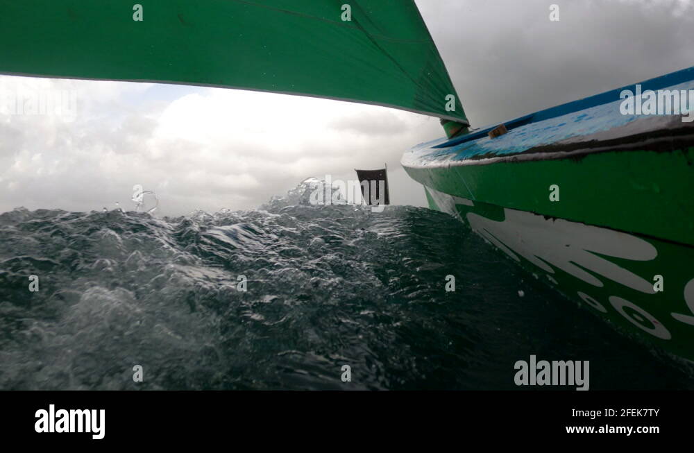 Yole Martinique gommier boat view above the water and underwater ...
