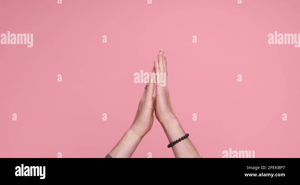 two hands holding together then parting, clapping and giving a thumbs ...