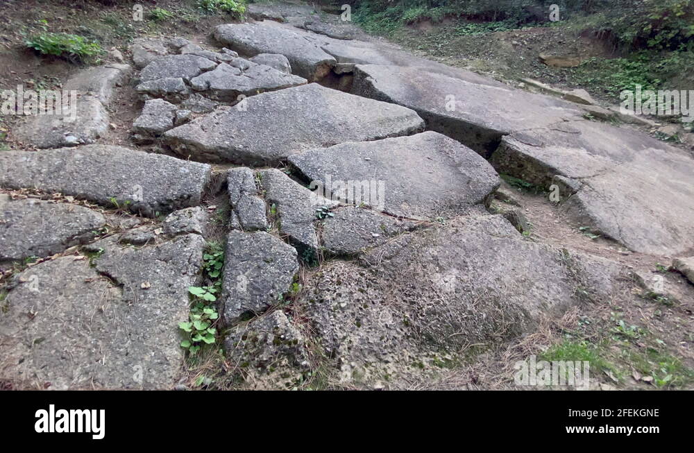 Dollye shows stones and concrete of excavations at the pyramid of sun ...
