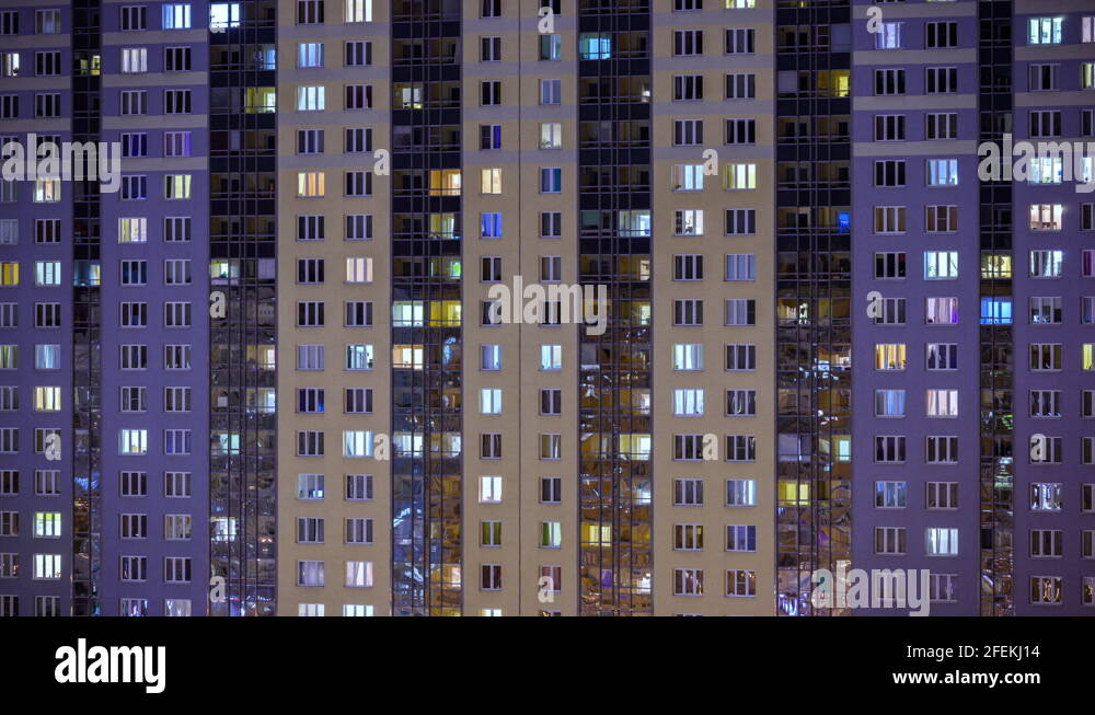 night window timelapse. architecture of the night city, urbanistic view ...
