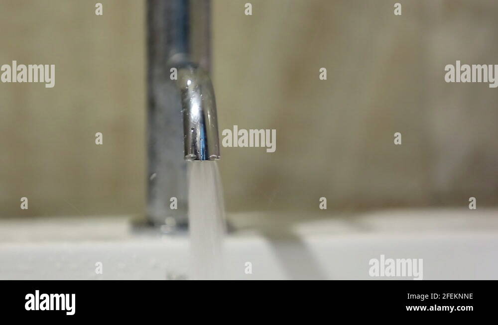 Open Tap Water flowing with full force in wash basin Stock Video ...