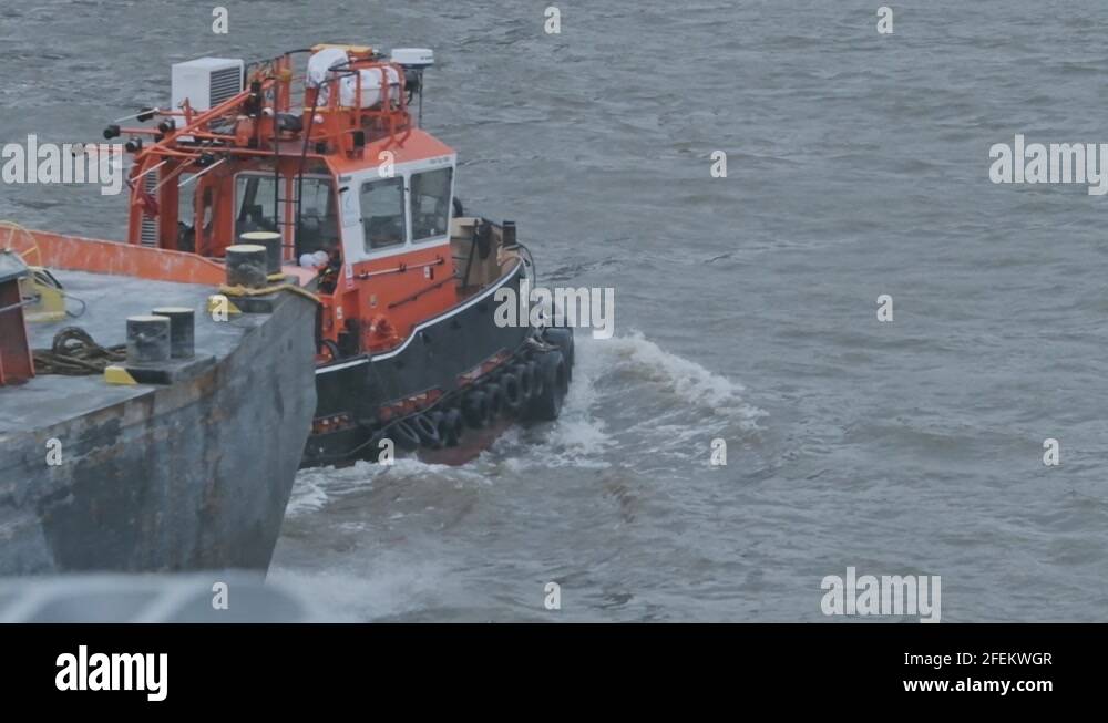 Pulling a barge Stock Videos & Footage - HD and 4K Video Clips - Alamy