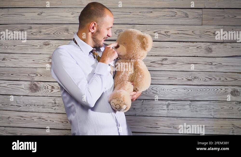 Man with teddy bear Stock Videos & Footage - HD and 4K Video Clips - Alamy