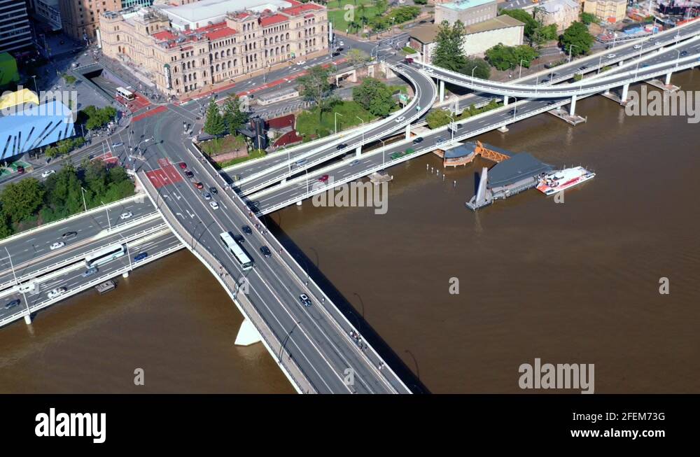 Bus And Cars Driving Across Victoria Bridge And Riverside Expressway In ...