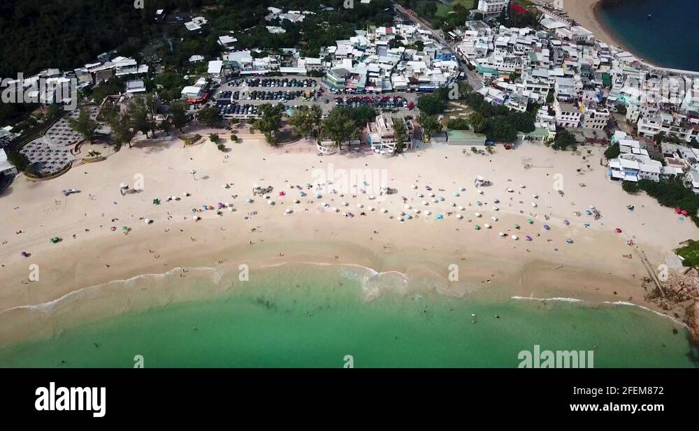 A static aerial view of a yacht at the Shek O beach in Hong Kong as ...