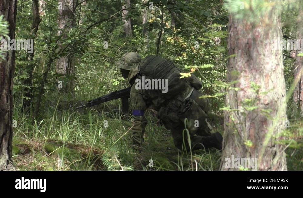 Russian soldier with a Kalashnikov assault rifle without a face with ...