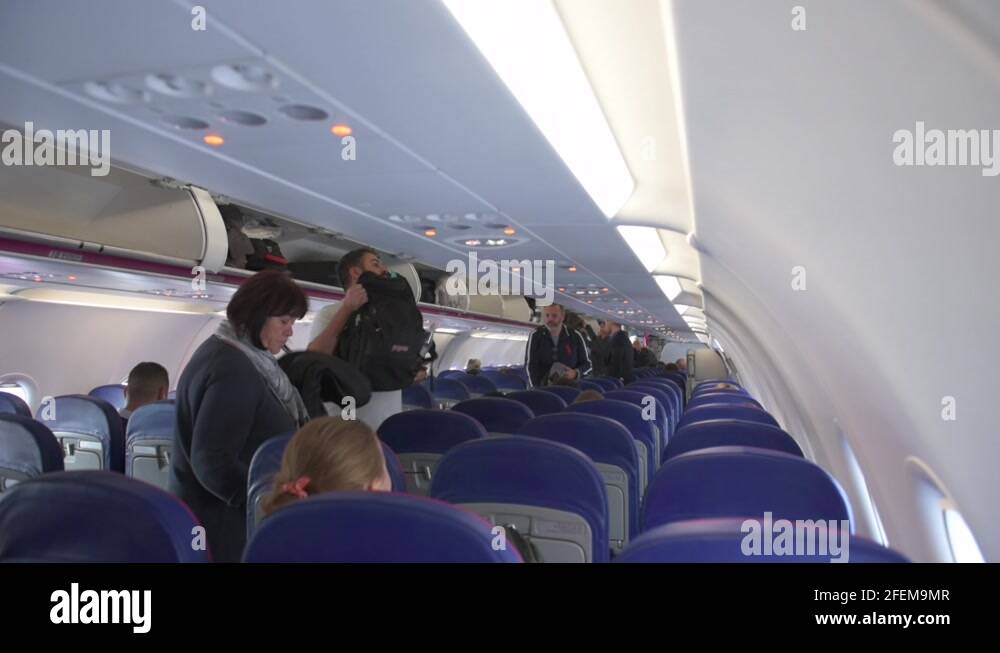 Wizzair Airplane Interior with Passangers. Boarding Procedure Stock ...