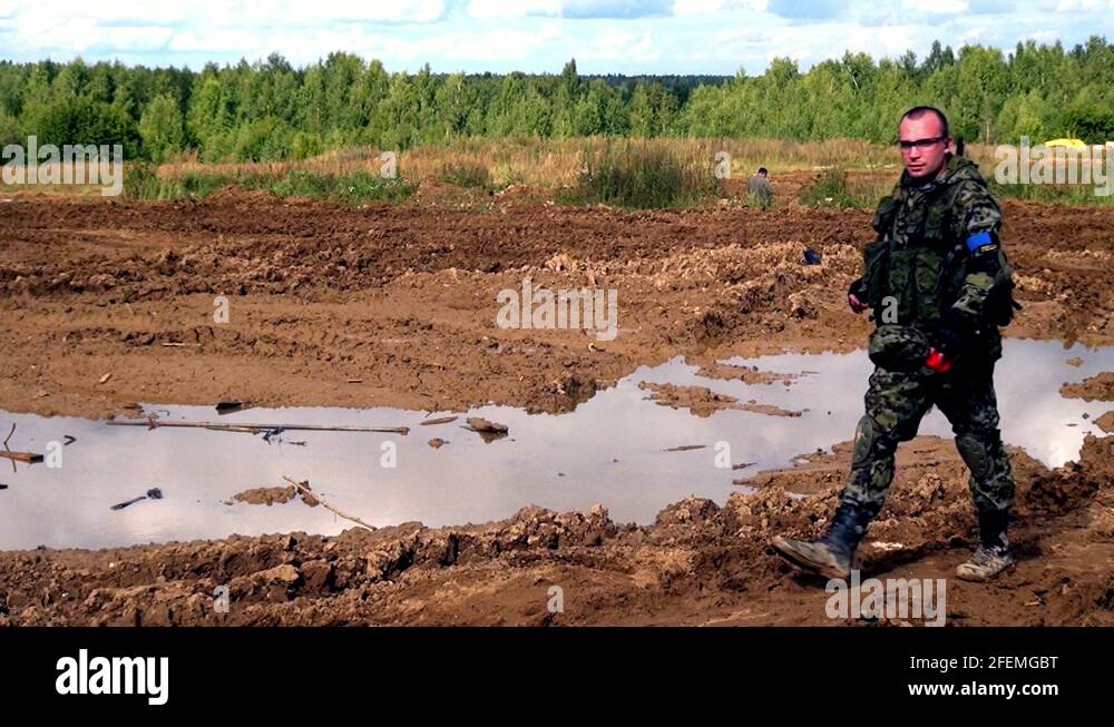 Squad of strikeball team with machine submachine guns Stock Video ...