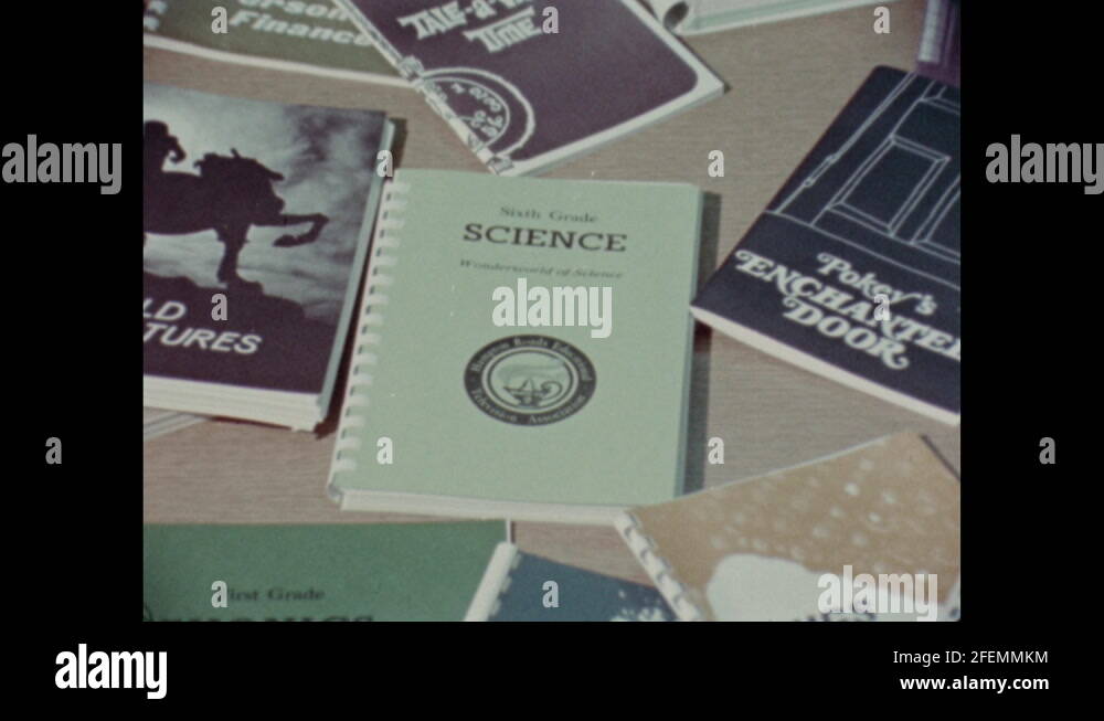 1960s: Science textbook. Selection of textbooks. Men and women seated ...