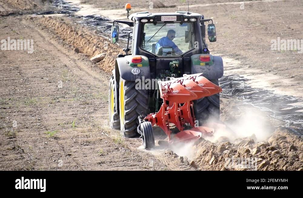 Earth tilling plough Stock Videos & Footage - HD and 4K Video Clips - Alamy