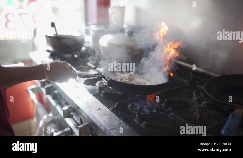 Flipping the pan Stock Videos & Footage - HD and 4K Video Clips - Alamy
