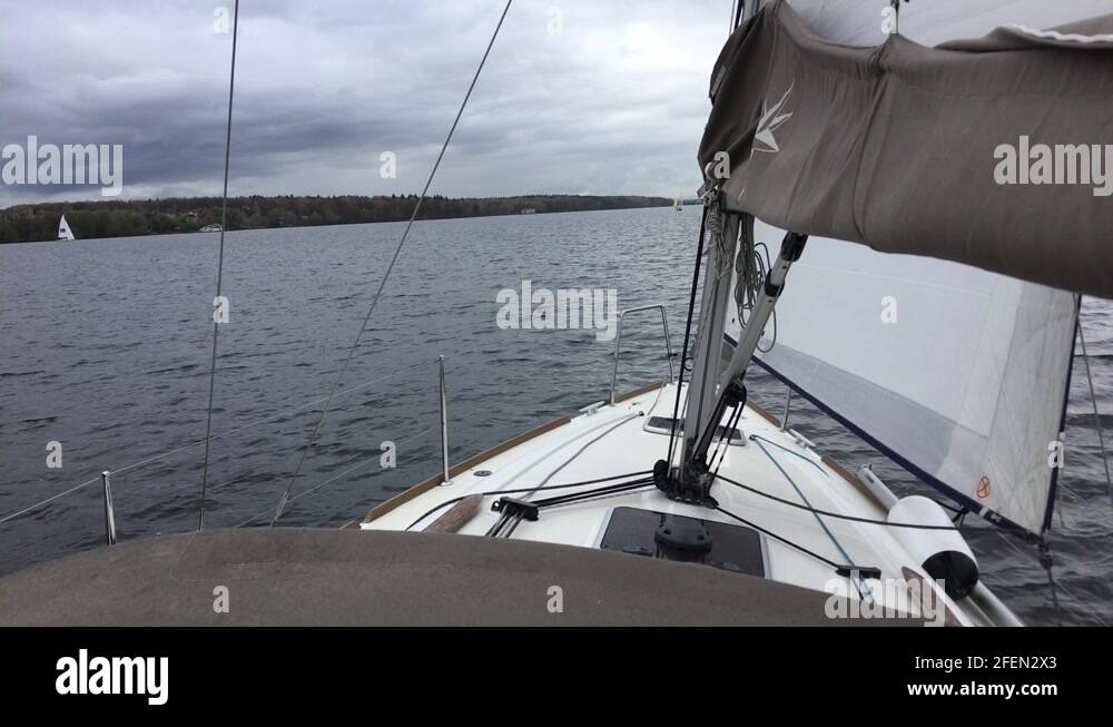 Yacht Series. The White Yacht is heading forward in full sail Stock ...