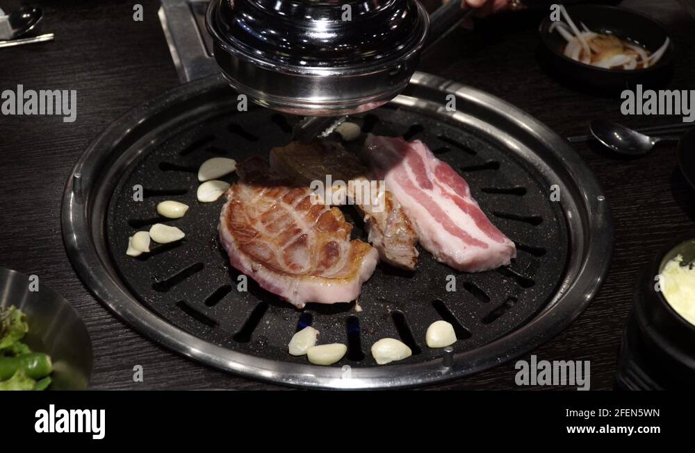 Samgyeopsal - Grilling Korean Pork Belly Barbeque With Garlic On ...