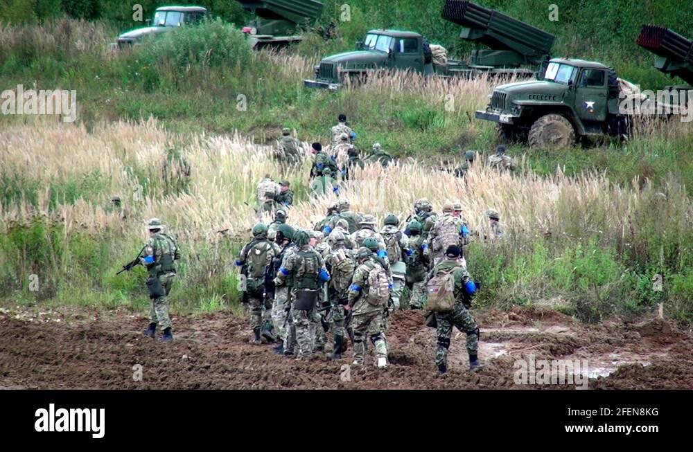 Squad of strikeball team with machine submachine guns Stock Video ...