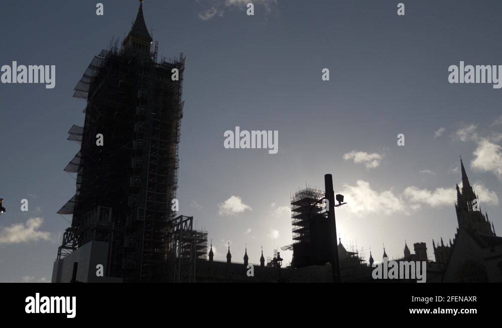 Silhouette View Of Big Ben In Scaffolding With Clouds Moving Past ...