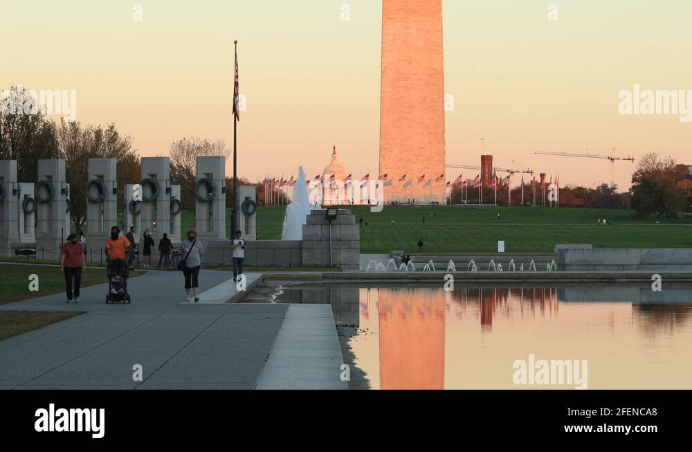 People in National Mall Park Walking By Lincoln Reflective Pool With ...