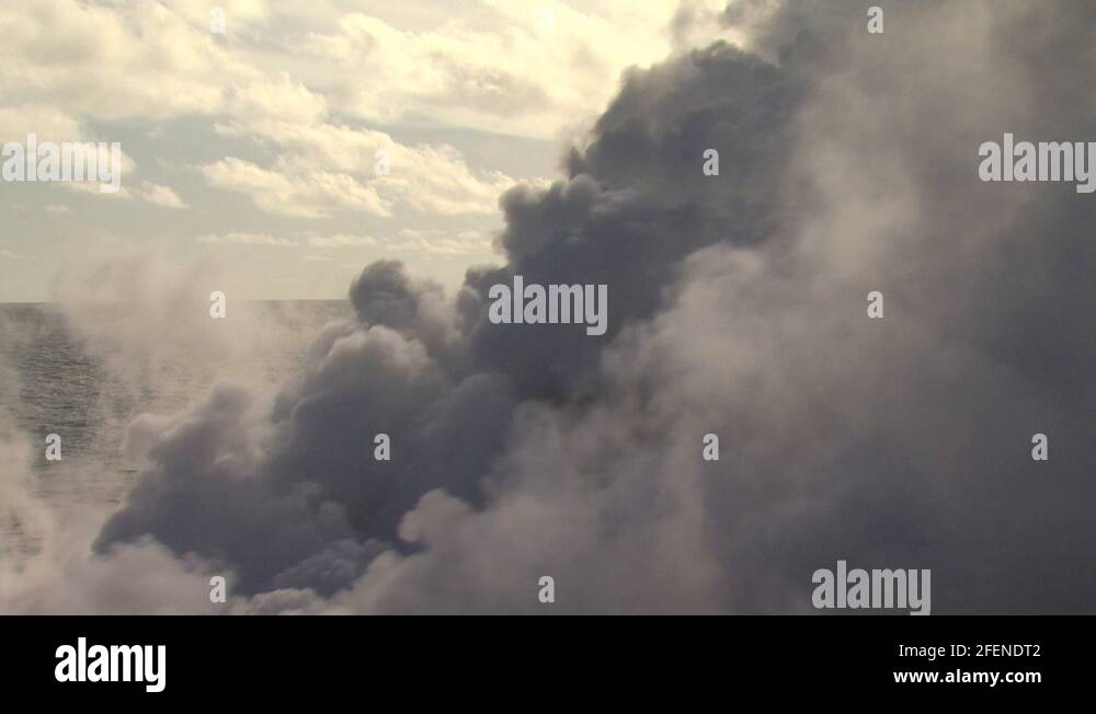Volcanic Steam Cloud Rising From the Ocean Stock Video Footage - Alamy