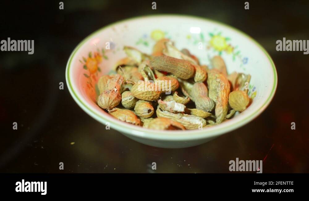 Shelling peanuts Stock Videos & Footage - HD and 4K Video Clips - Alamy