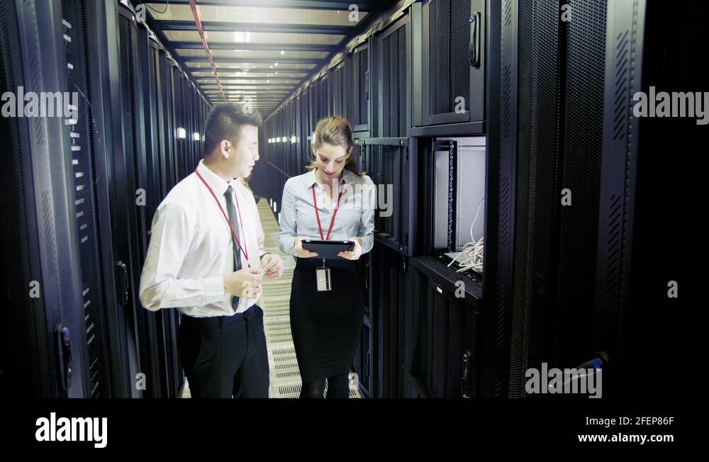 Team of IT engineers working in a data centre Stock Video Footage - Alamy