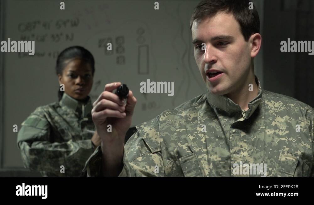Soldier explaining a plan of action to a fellow soldier Stock Video ...
