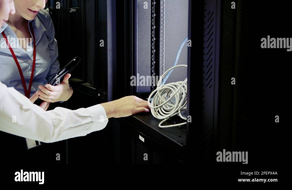 Team of IT engineers working in a data centre Stock Video Footage - Alamy