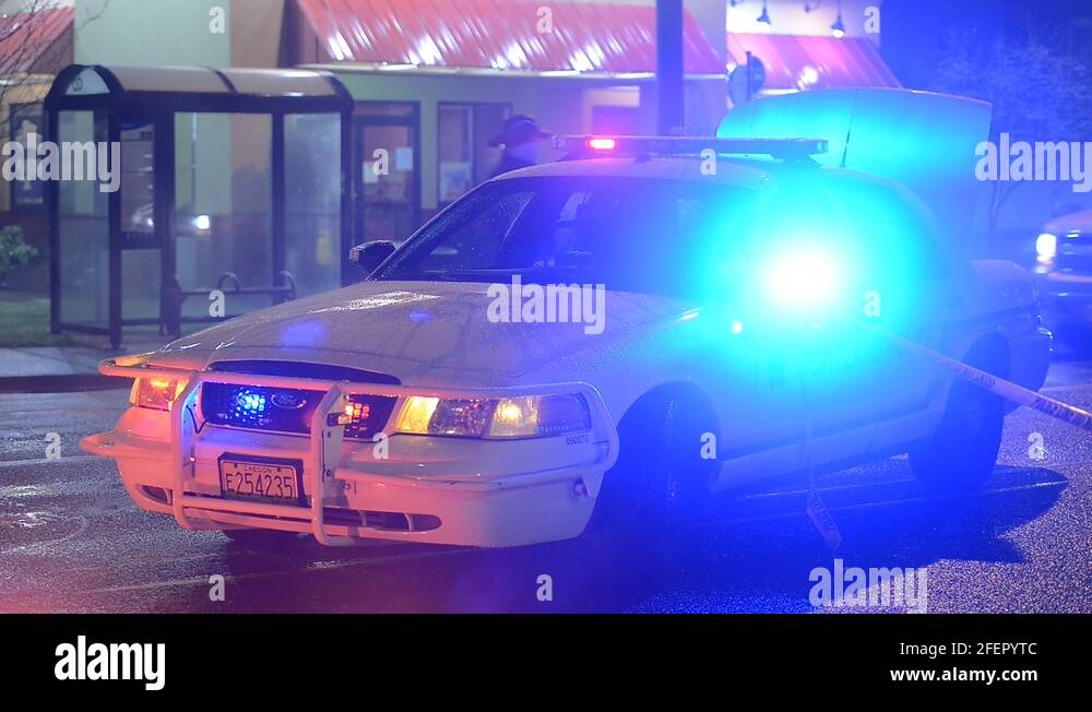 Police Car Redirecting Traffic From Crime Scene Stock Video Footage - Alamy