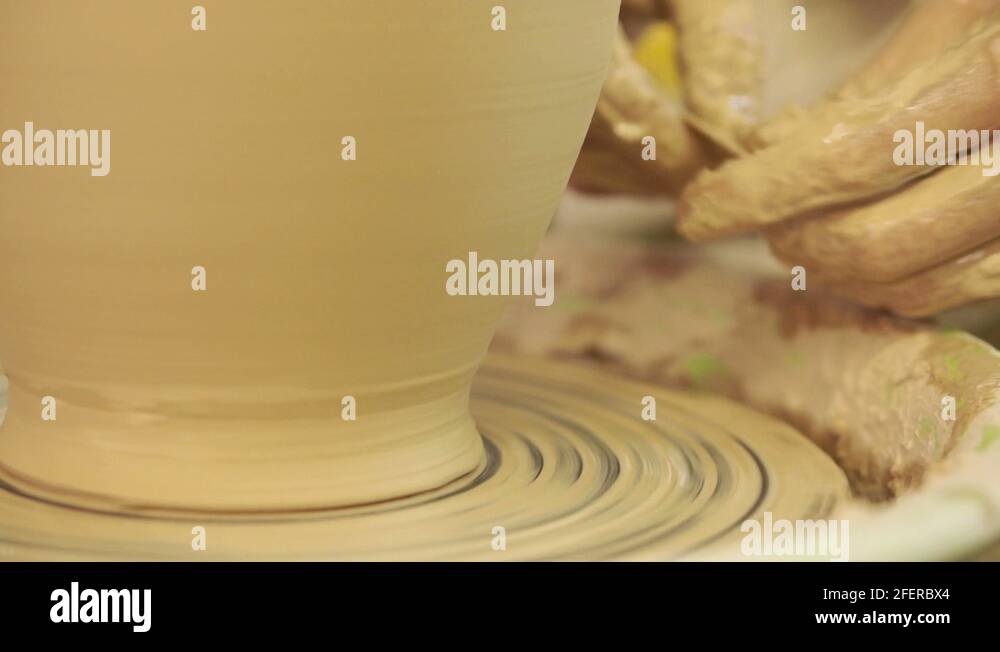 Potter works. Crockery creation process in pottery on potters' wheel ...