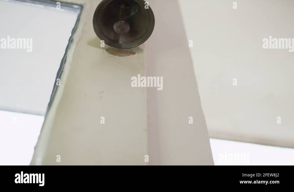 Quaint old fashioned bell ringing on a shop door Stock Video Footage ...