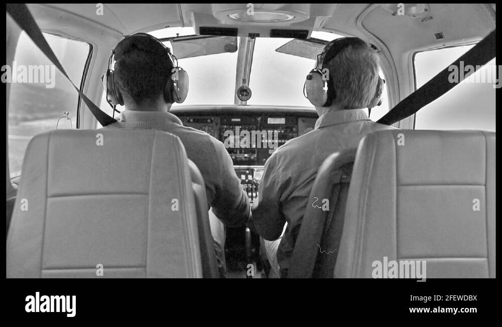 Pilot in Airplane Cockpit - Vintage Film of Plane Interior while Flying ...