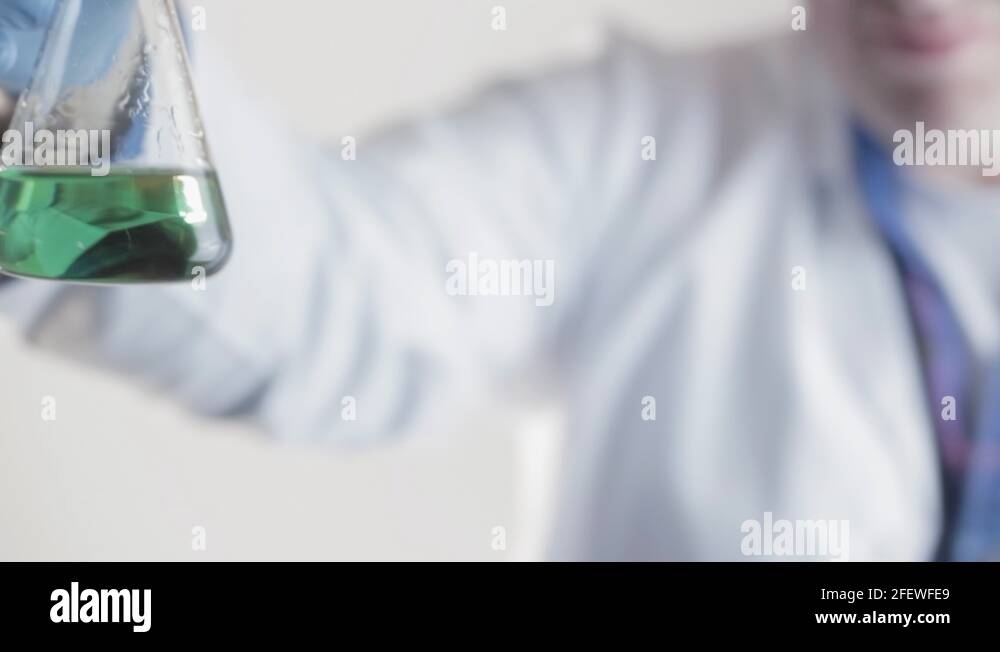Scientist with flask Stock Videos & Footage - HD and 4K Video Clips - Alamy