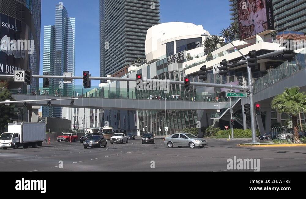 Traffic street and pedestrian bridge by day, Las Vegas Strip, Las Vegas ...