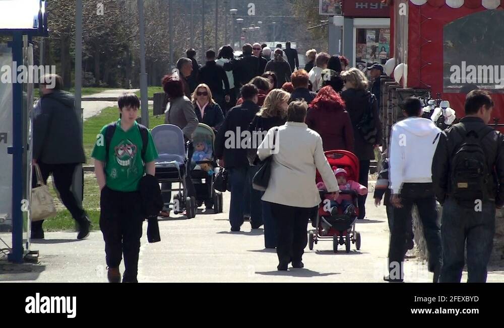A crowd of residents of Slavutych on a city street Stock Video Footage ...