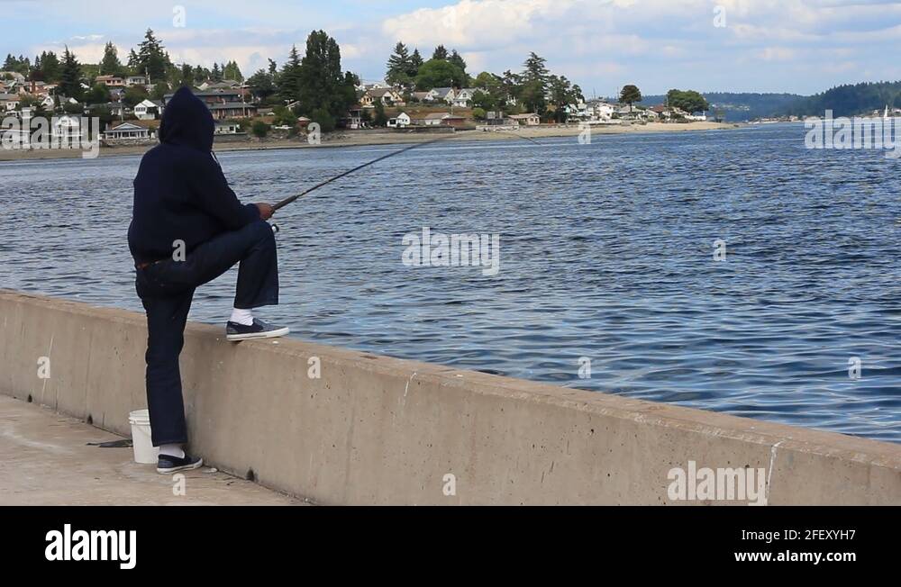 Fishing off the pier Stock Videos & Footage - HD and 4K Video Clips - Alamy