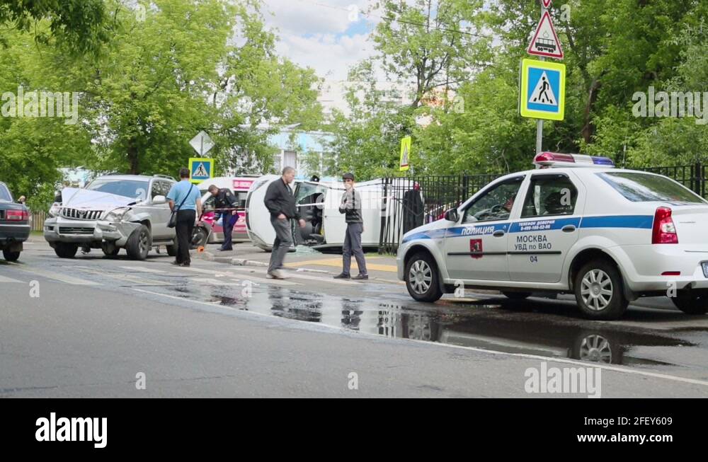 Police work on serious car accident at intersection of passages Stock ...