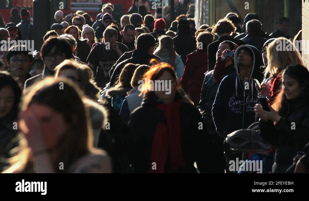 Crowd of people walking across Westminster Bridge - London, UK Stock ...