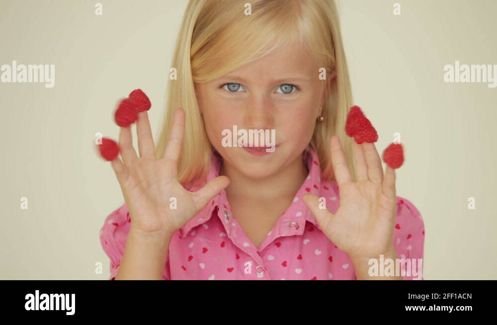Beautiful little girl eating raspberry Stock Videos & Footage - HD and ...