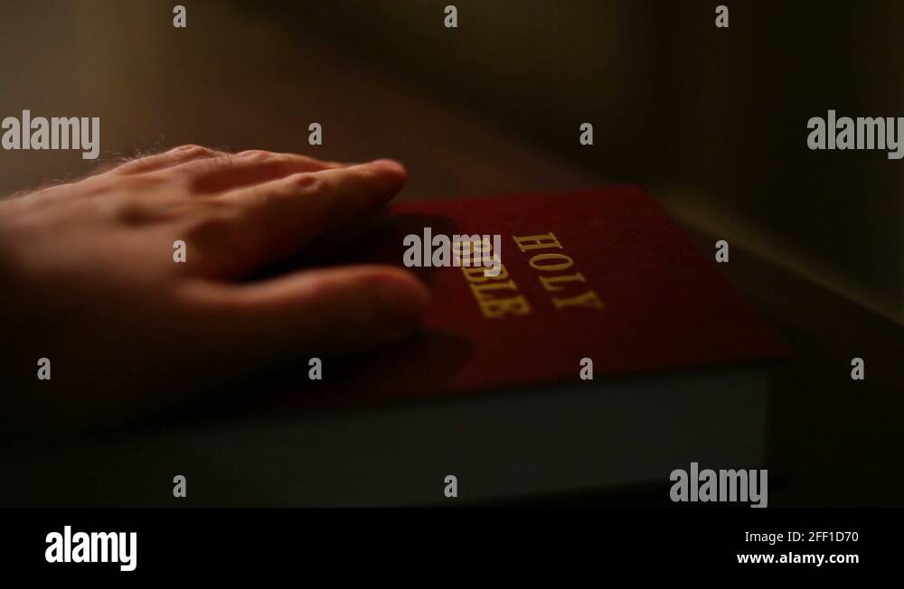 Holy bible hand Stock Videos & Footage - HD and 4K Video Clips - Alamy