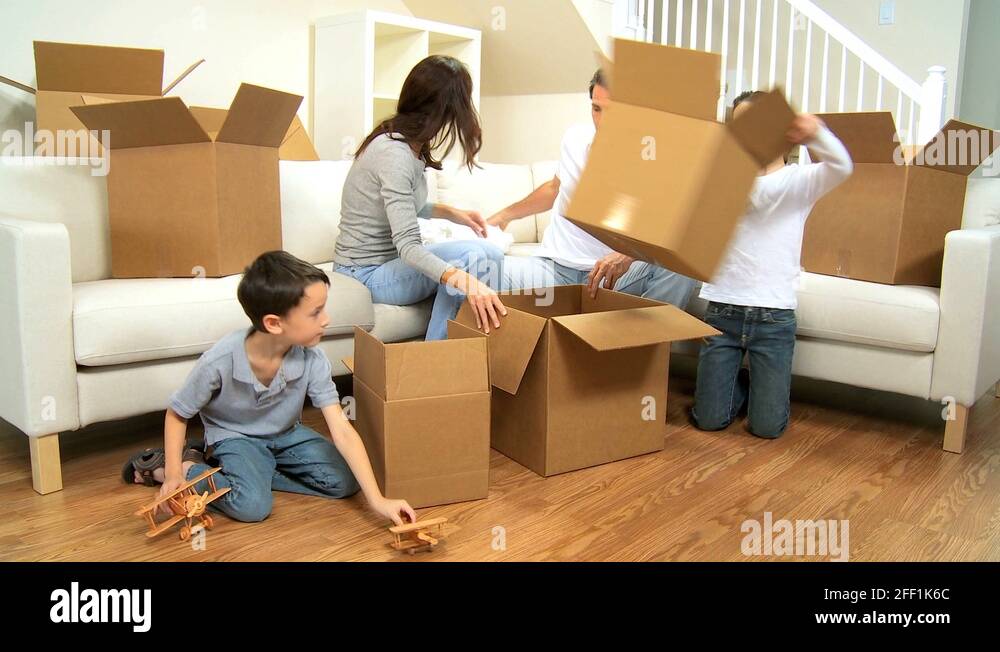 Family moving boxes Stock Videos & Footage - HD and 4K Video Clips - Alamy