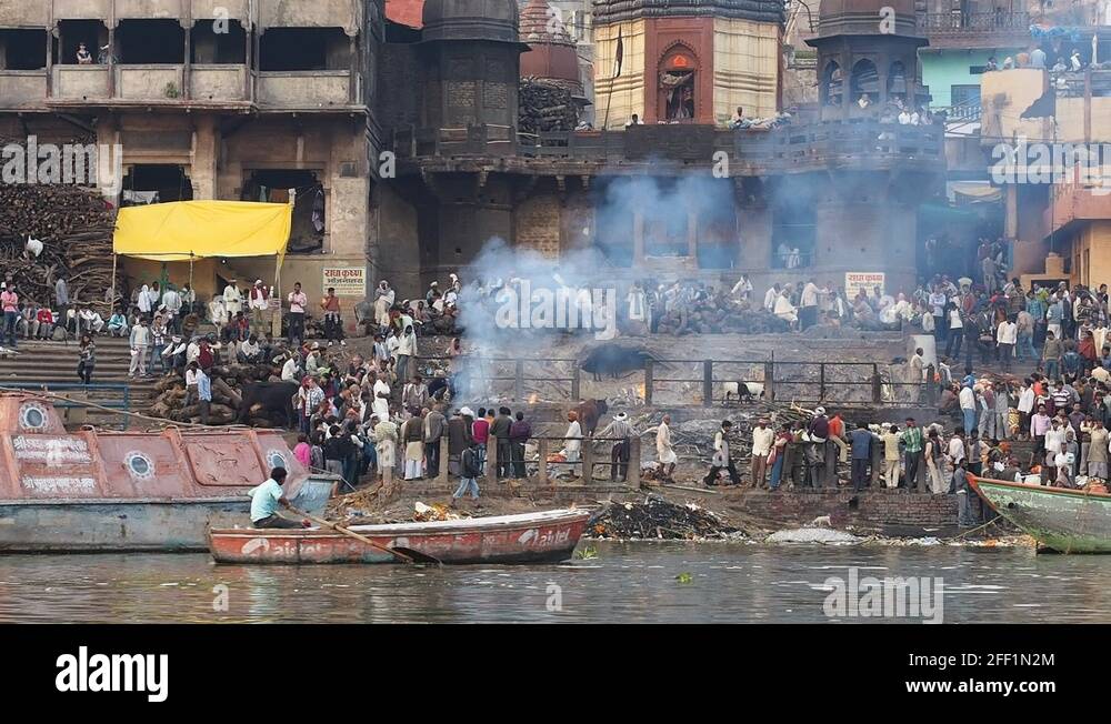 Burning Ghat on the Banks of the Ganges River in Varanasi, India Stock ...