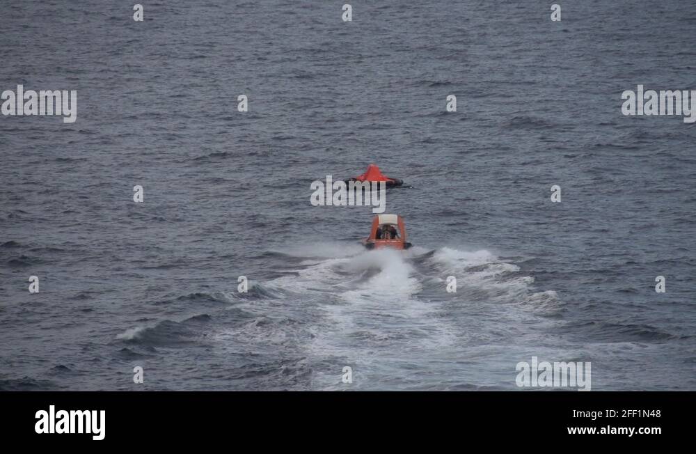Mediterranean, rescue boat heads to life raft at sea Stock Video ...