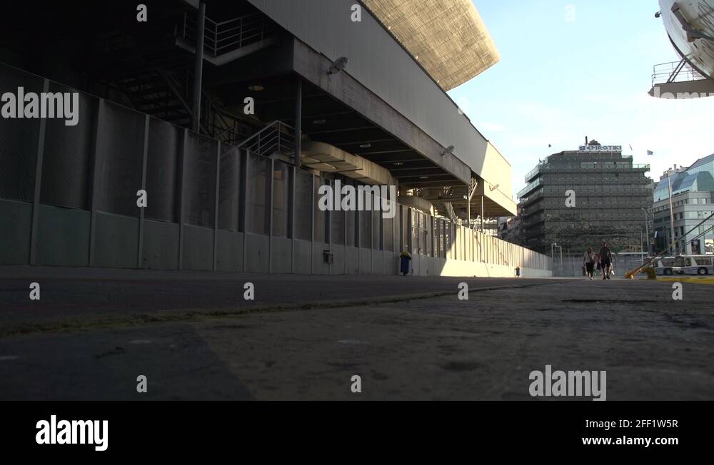 dock (apron) wide body bus arrives, low angle Stock Video Footage - Alamy