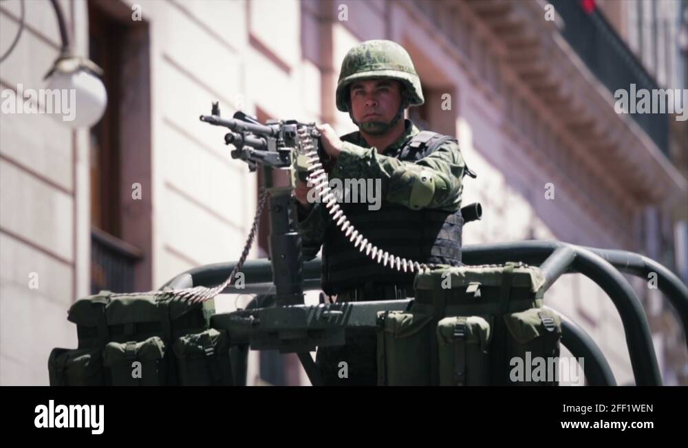 Soldier on humvee with machine gun Stock Video Footage - Alamy