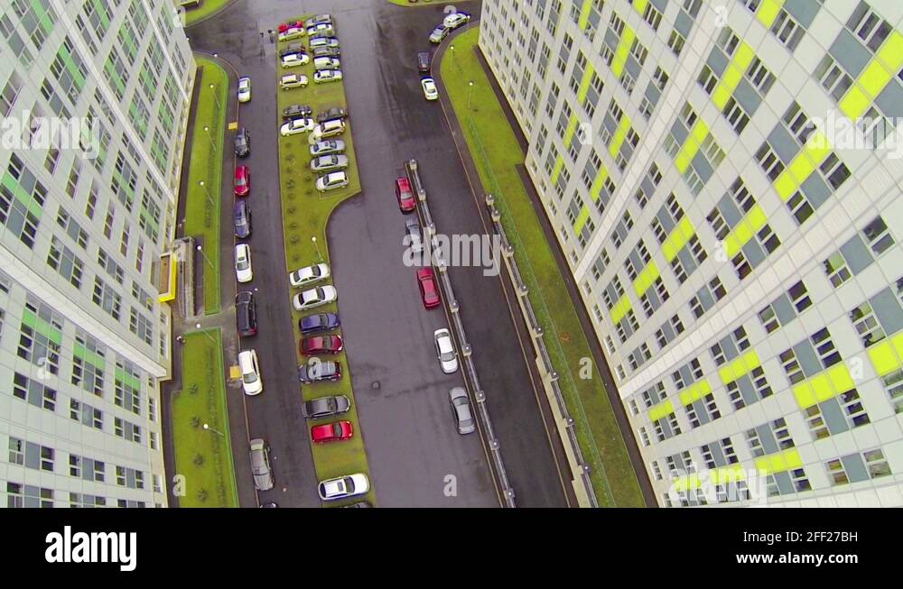 Many cars parked between buildings Stock Videos & Footage - HD and 4K ...