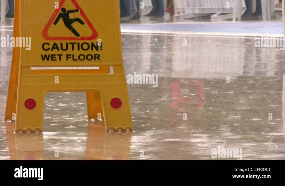 Slippery floor sign office Stock Videos & Footage - HD and 4K Video ...
