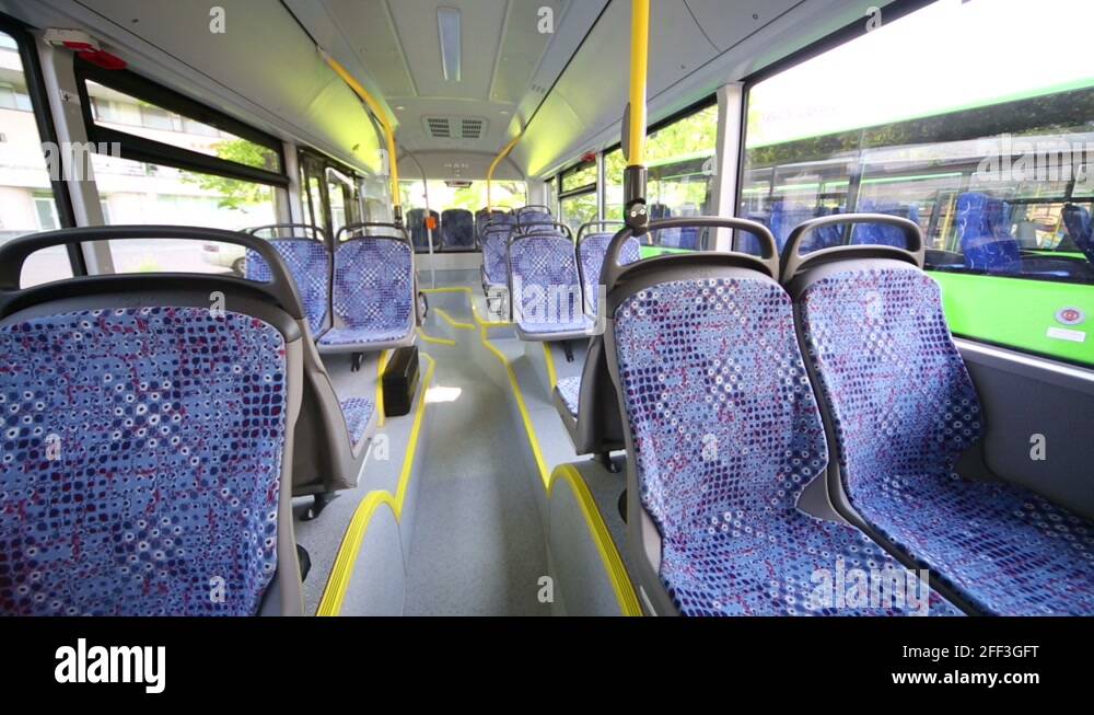 Rows of empty seats inside saloon of empty city bus Stock Video Footage ...