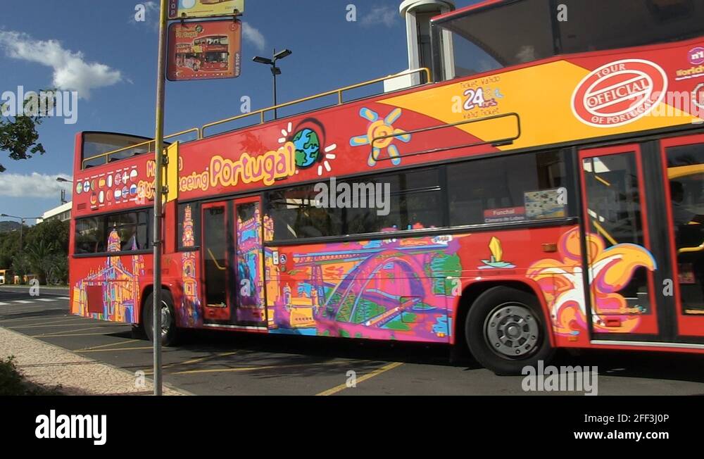 Red open top sightseeing bus Stock Videos & Footage - HD and 4K Video ...