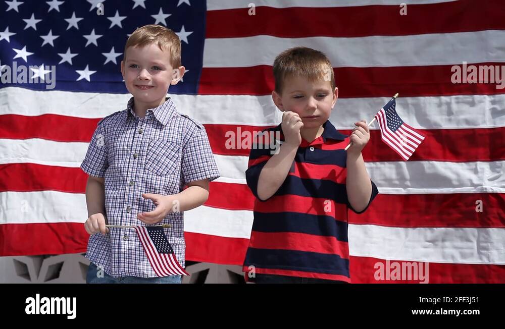 Boys waving flags Stock Videos & Footage - HD and 4K Video Clips - Alamy