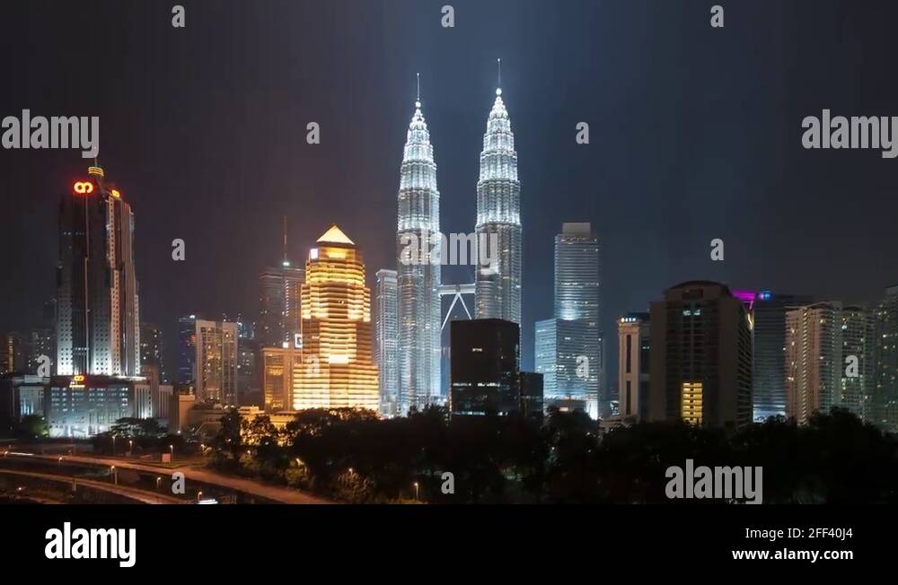 Petronas Twin Tower at Night Time Lapse (1080p Stock Video Footage - Alamy
