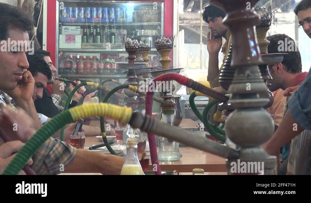 Men in traditional teahouse smoking Stock Videos & Footage - HD and 4K ...